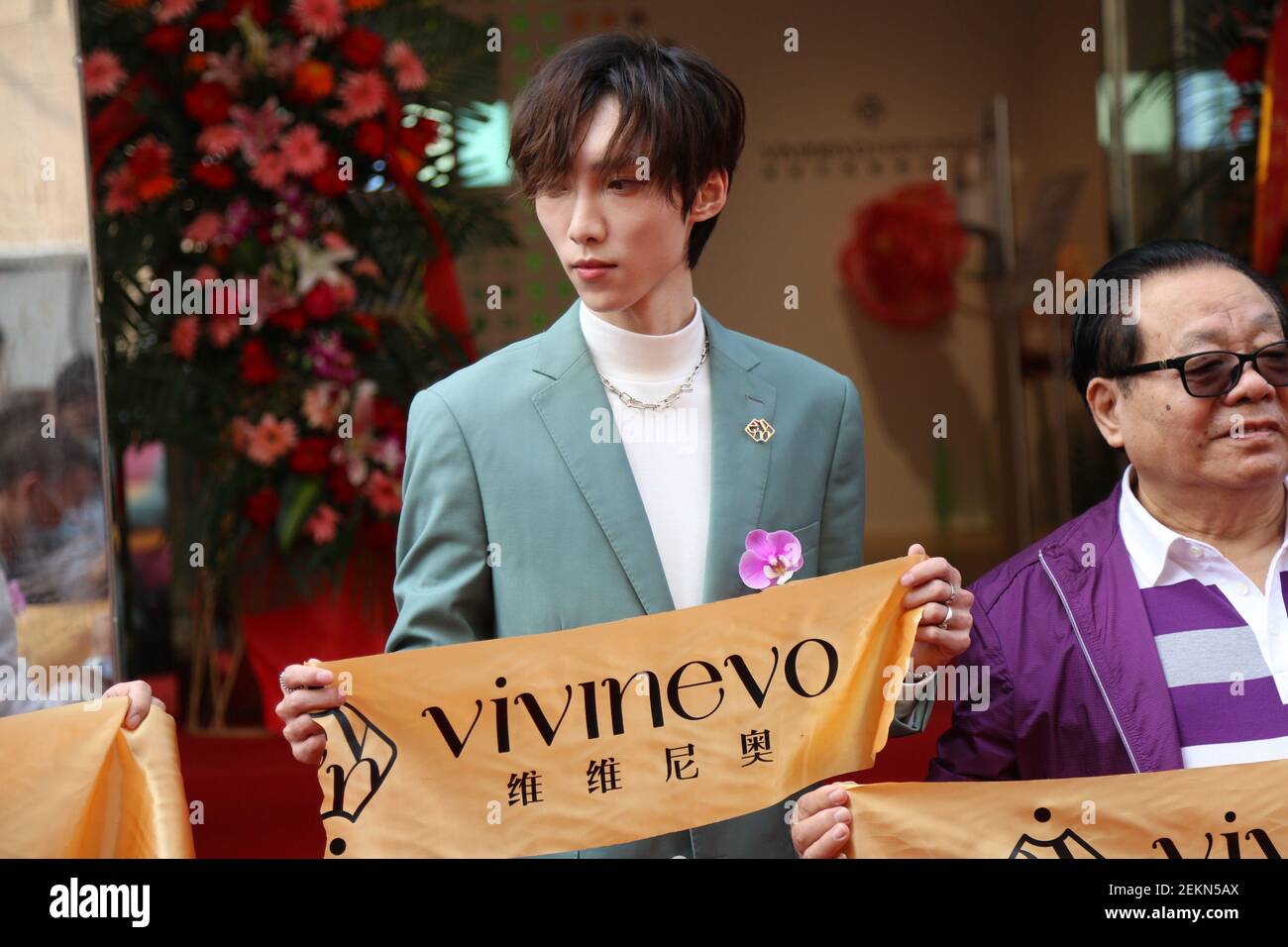 Ray Zhao or Zhao Lei of Chinese idol boy band R1SE attends the opening ...