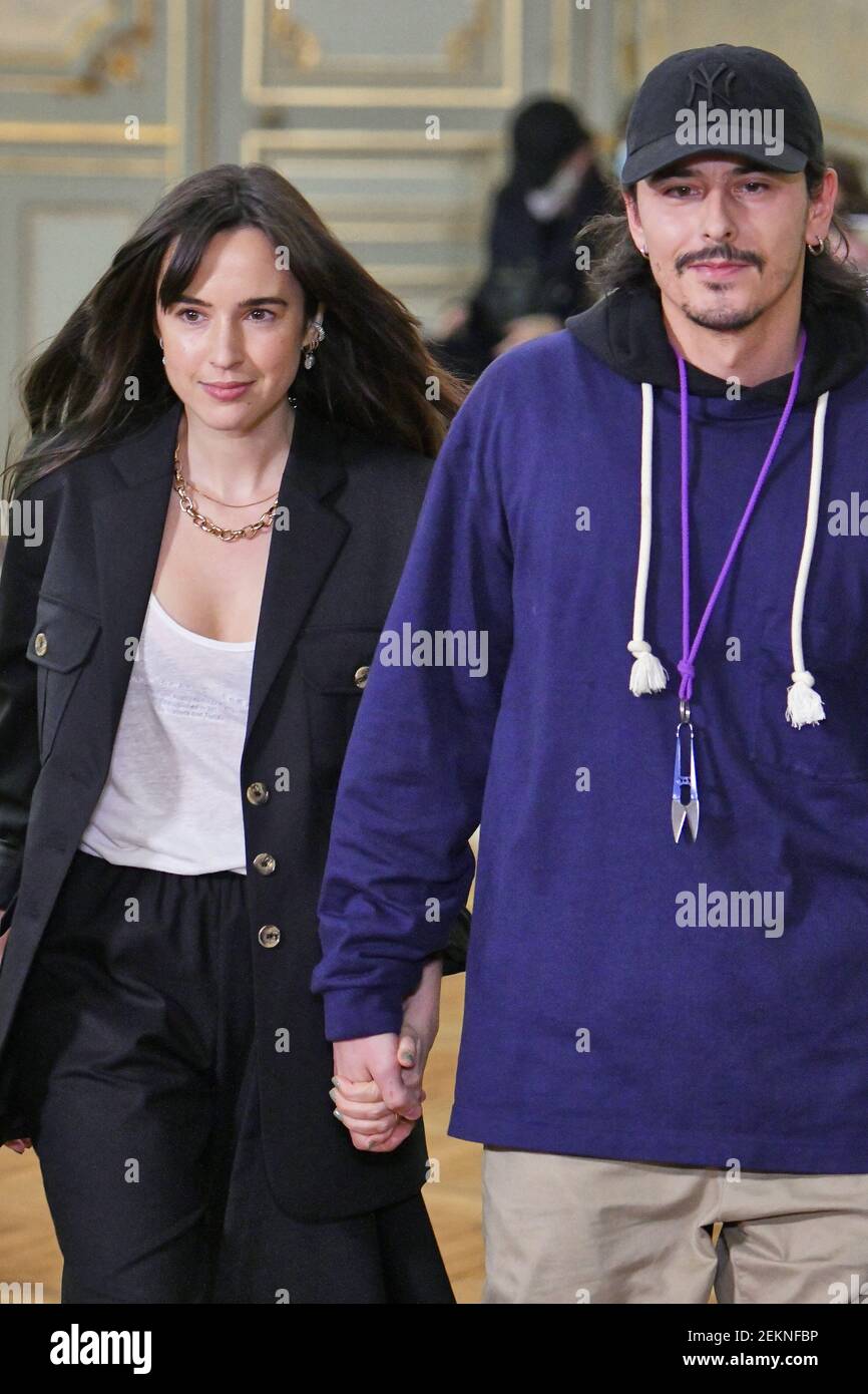 Designers Victoria Feldman and Tomas Berzins walks on the runway during ...