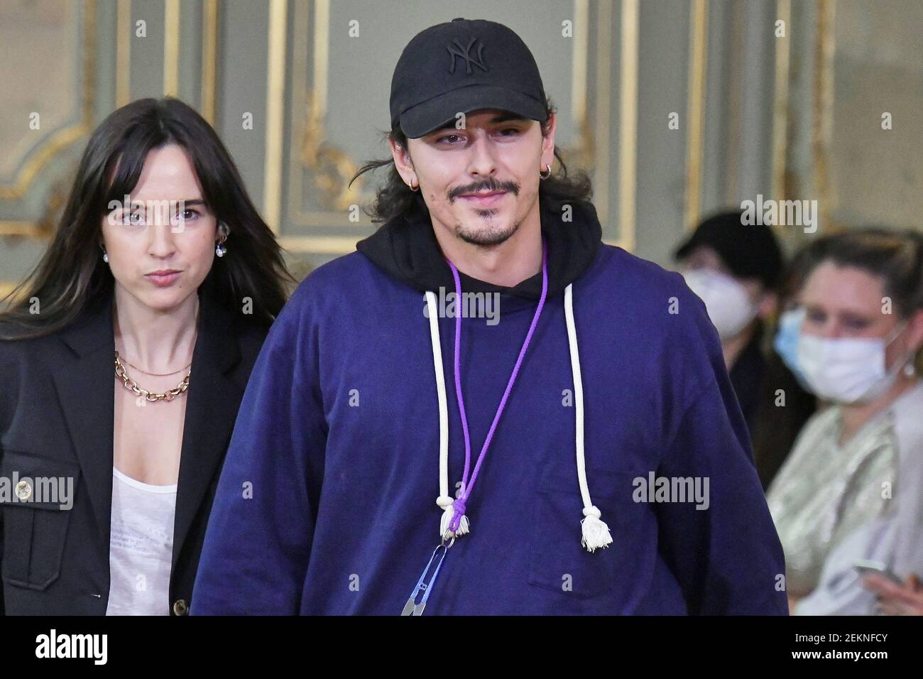 Designers Victoria Feldman and Tomas Berzins walks on the runway during ...