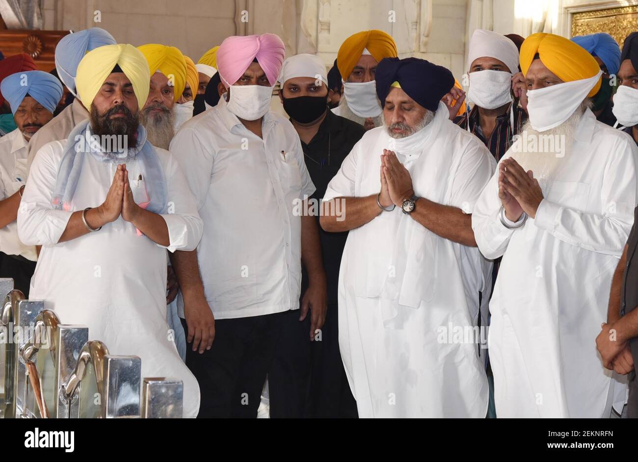 AMRITSAR, INDIA - OCTOBER 1: Shiromani Akali Dal (SAD) president Sukhbir Singh Badal (c) pays ...