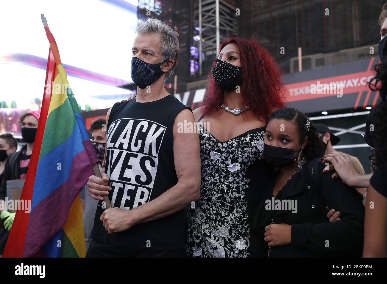 A protester holds a rainbow flag in support of transgender lives during ...