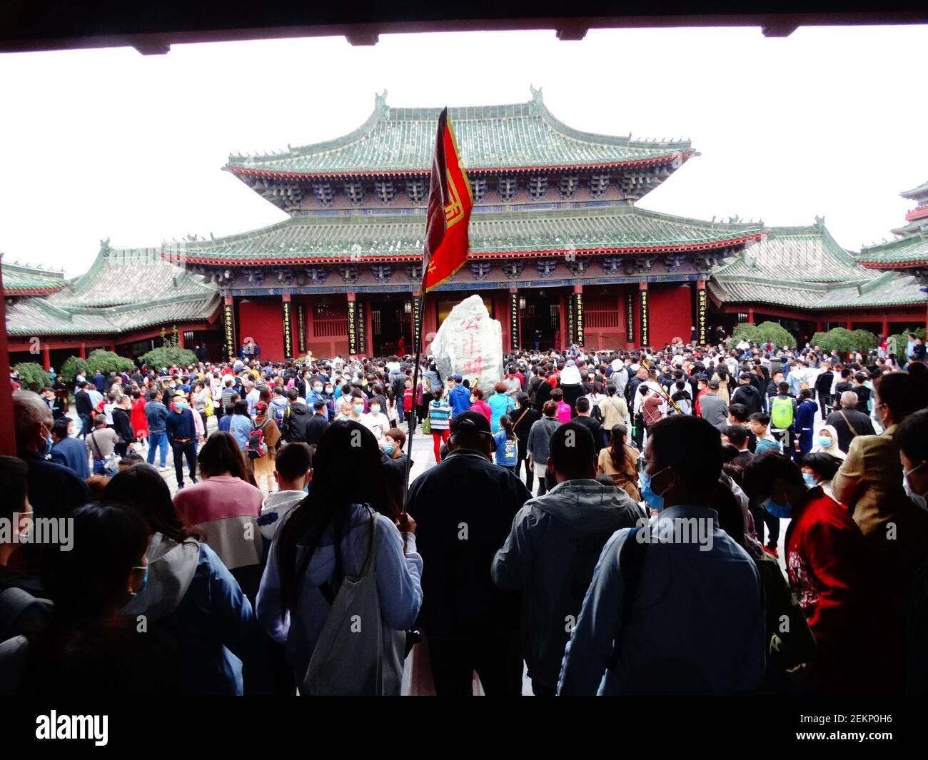 Visitors line up to get into Kaifengfu, or Yamen of Ancient Kaifeng, a ...