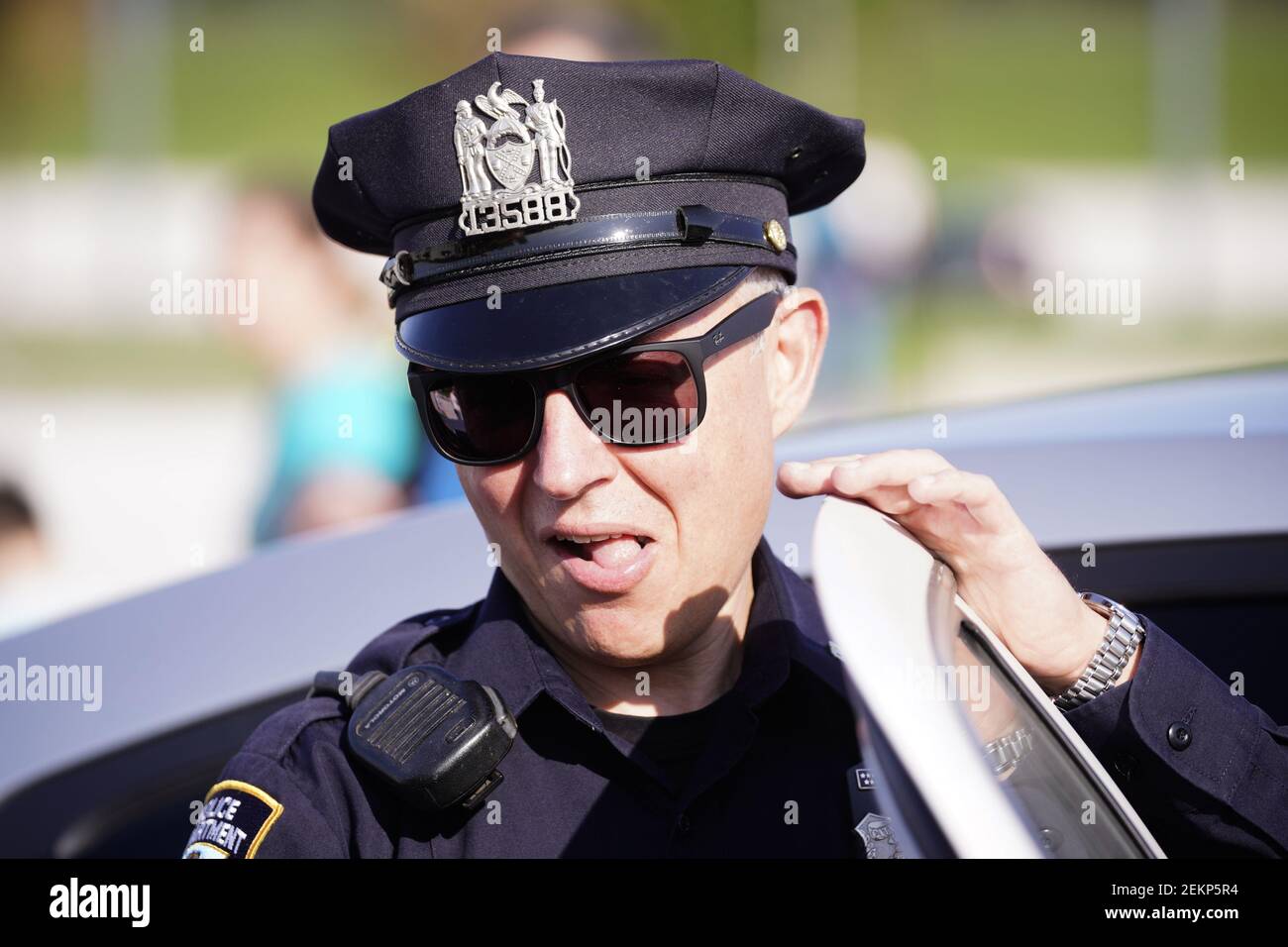 A man dressed as an American police officer is seen during the American ...
