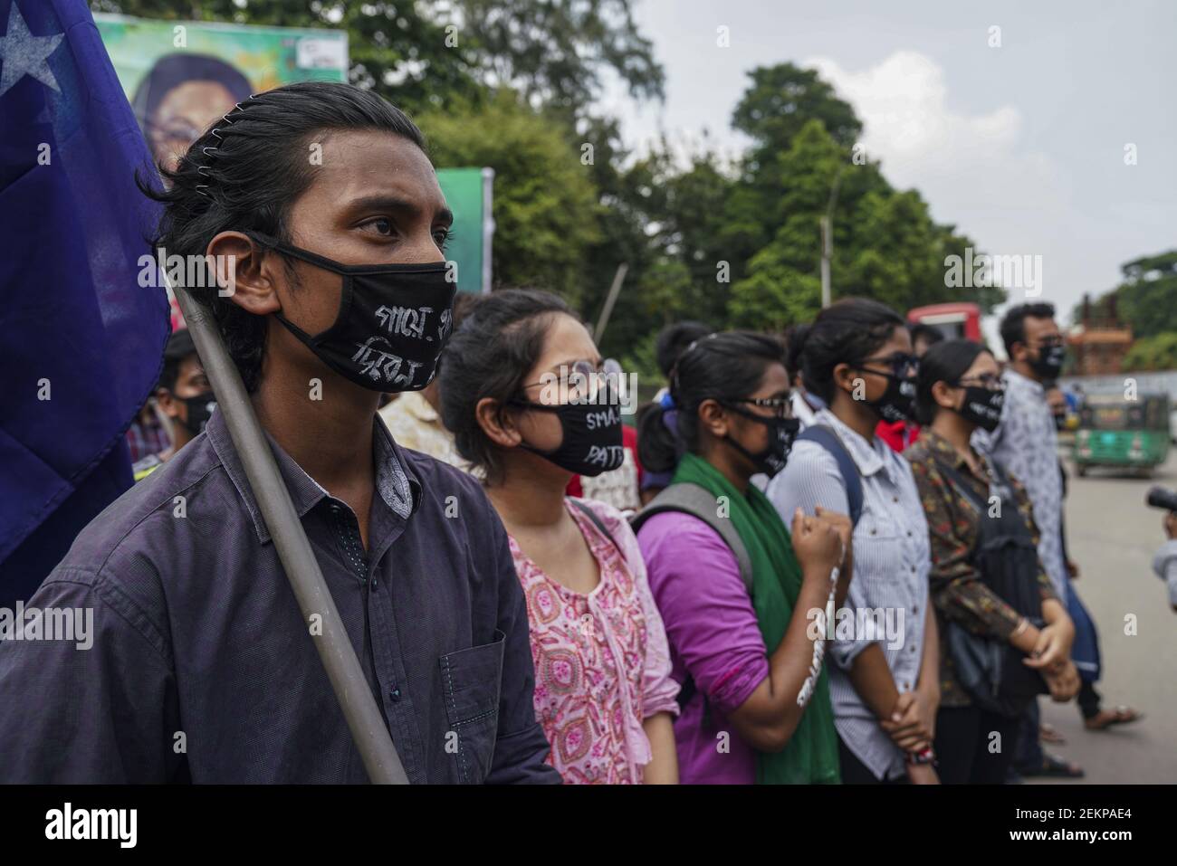 A protester wearing a face mask with anti rape inscriptions, during the ...