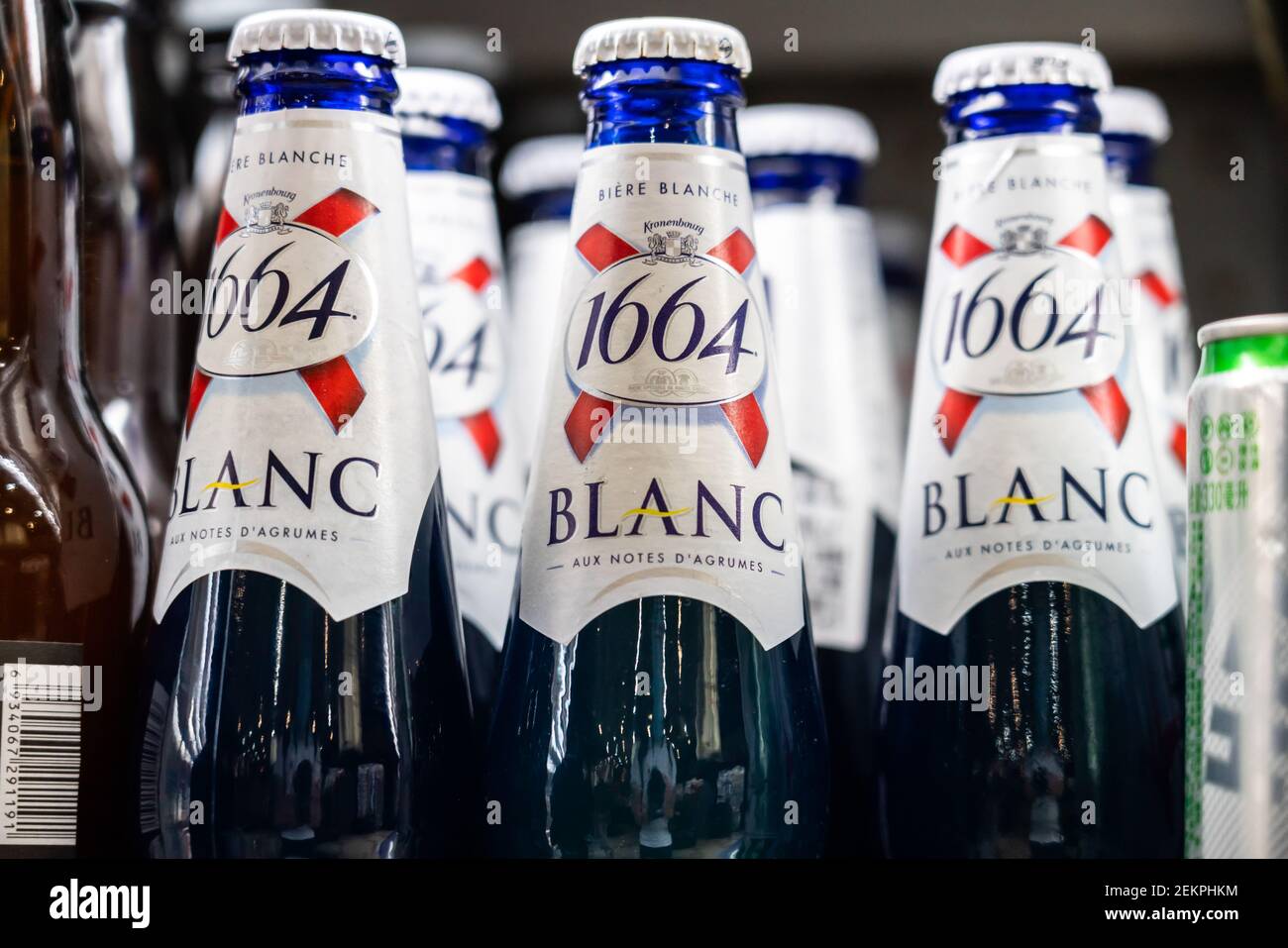Bottles of Kronenbourg 1664 Blanc beer seen in a supermarket. (Photo by ...