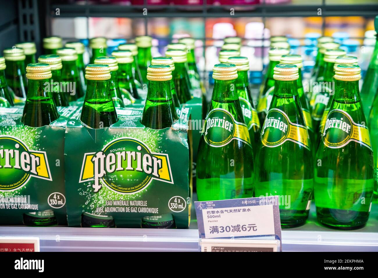 French natural bottled mineral water Perrier seen at a supermarket ...