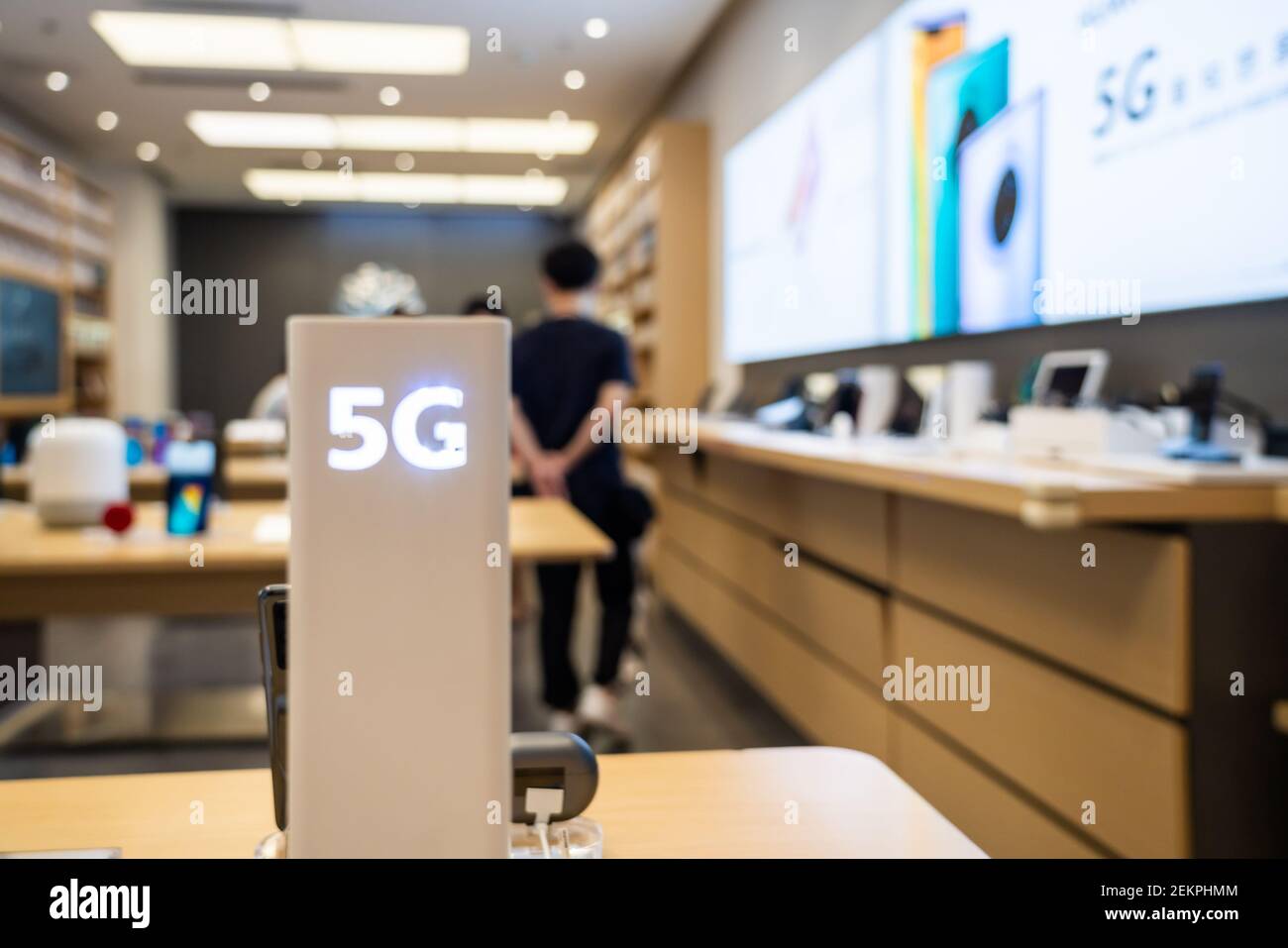 5G sign seen at a Huawei retail store in Shenzhen. (Photo by Alex Tai ...