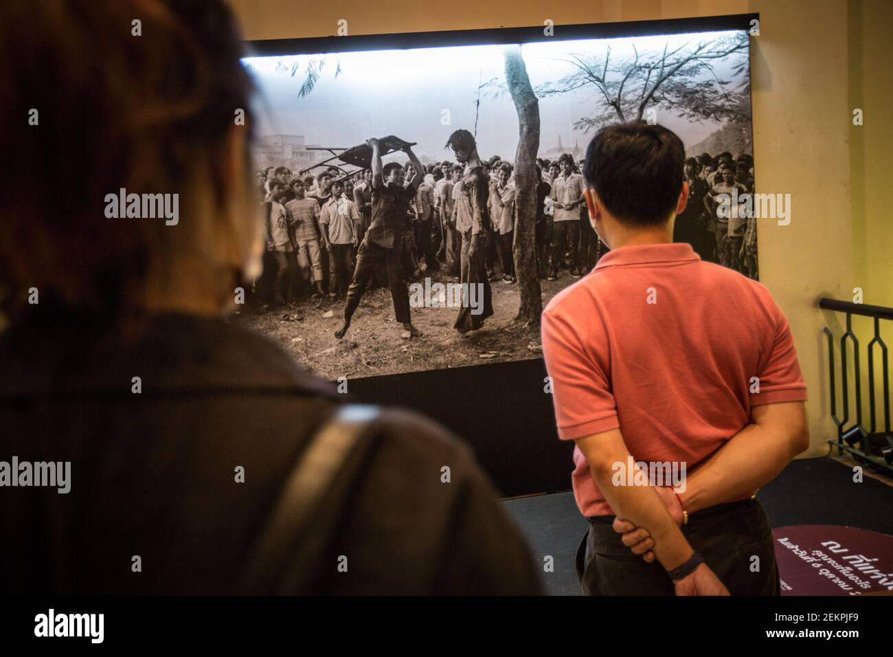 Visitors seen looking at a photograph from US photojournalist Neal ...
