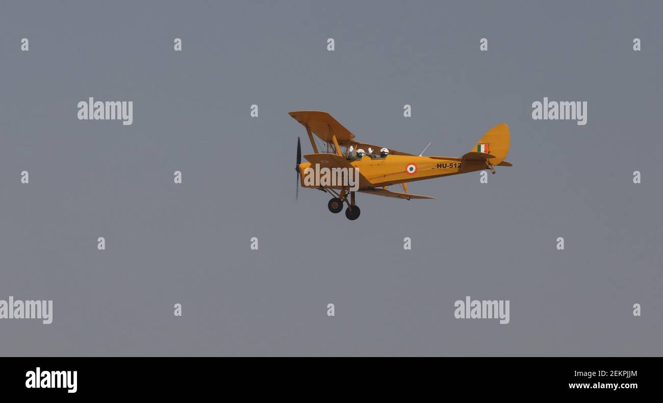 An Indian Air Force (IAF) Tiger Moth flying past its aircraft during ...