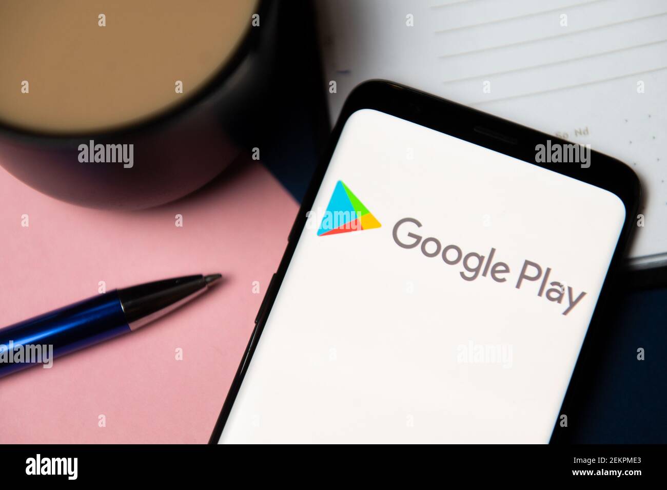 In this photo illustration a Google Play logo displayed on a smartphone. (Photo by Mateusz ...