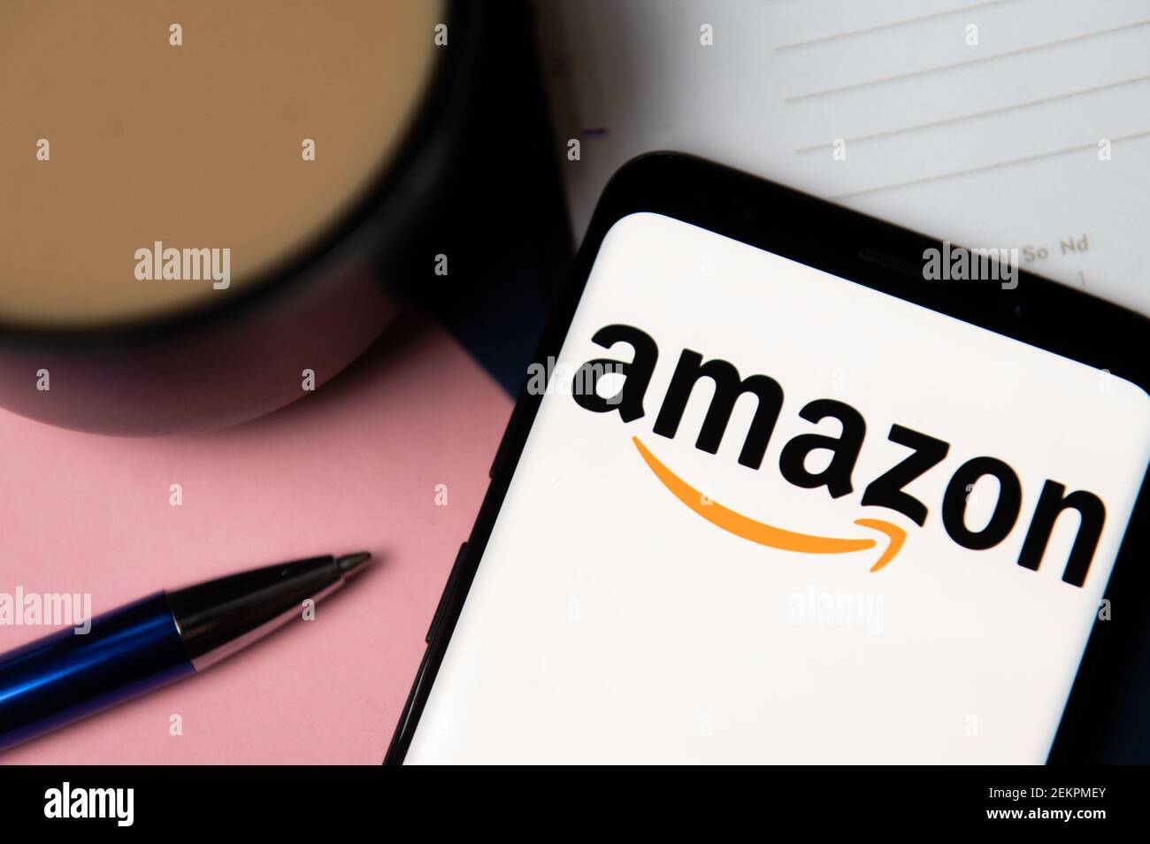 In this photo illustration Amazon logo displayed on a smartphone ...