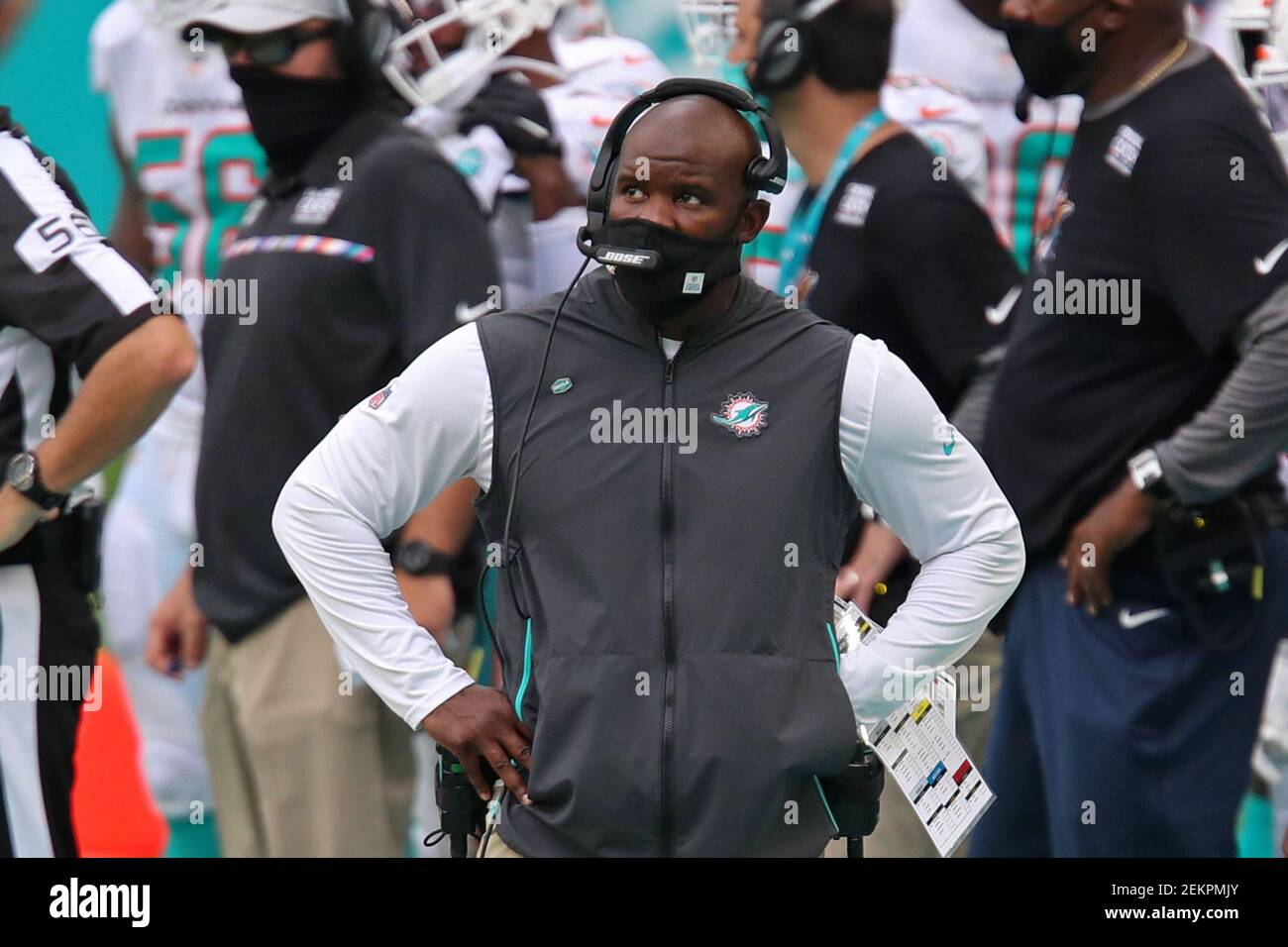 Miami Dolphins head coach Brian Flores looks up at the scoreboard as ...
