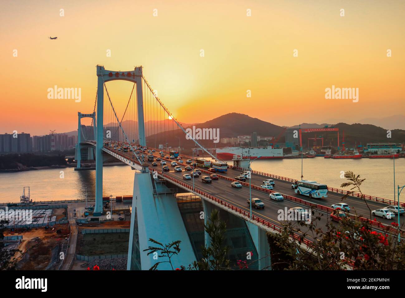 --FILE--Sunset scenery seen at the Haicang Bridge in Xiamen city ...