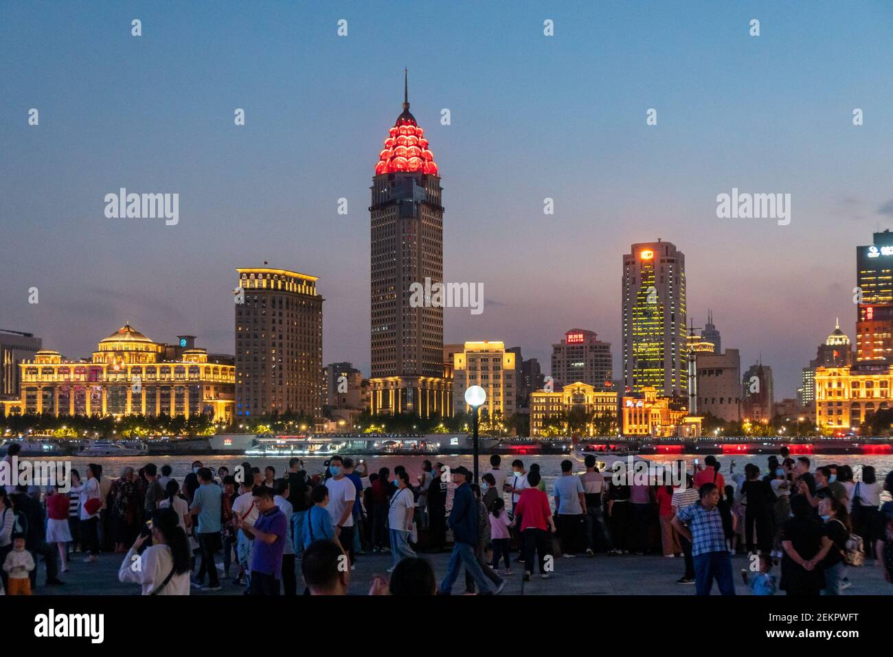 The Pudong Riverside Promenade along the Huangpu river is full of ...