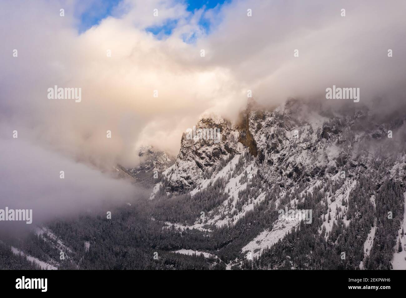 Aerial of mountains in styria, Green lake Gruner see cloudy winter day ...