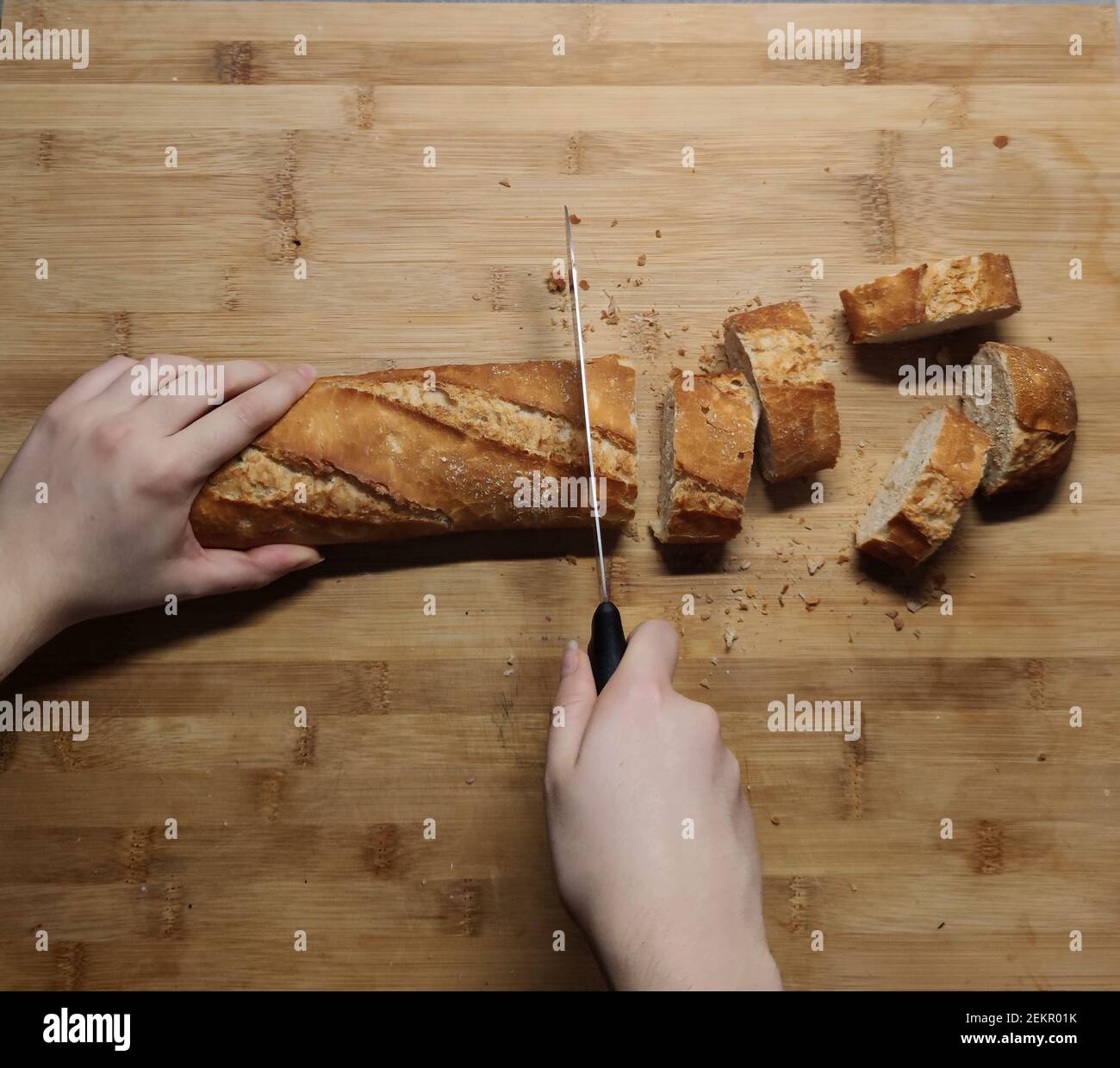 Hand cut bread on board hi-res stock photography and images - Alamy