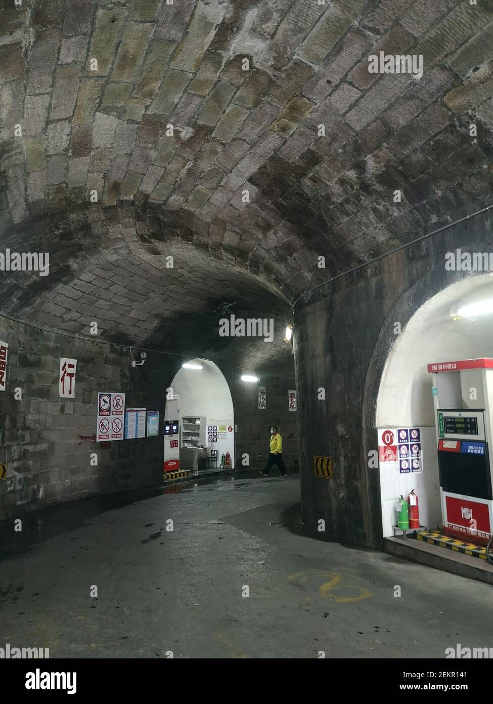 A gas station with 6 fuel dispensers are built in a air-raid shelter ...