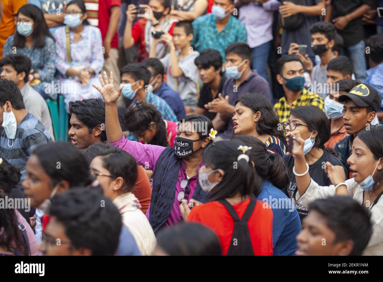 A protester shouting slogans while making gestures during the ...