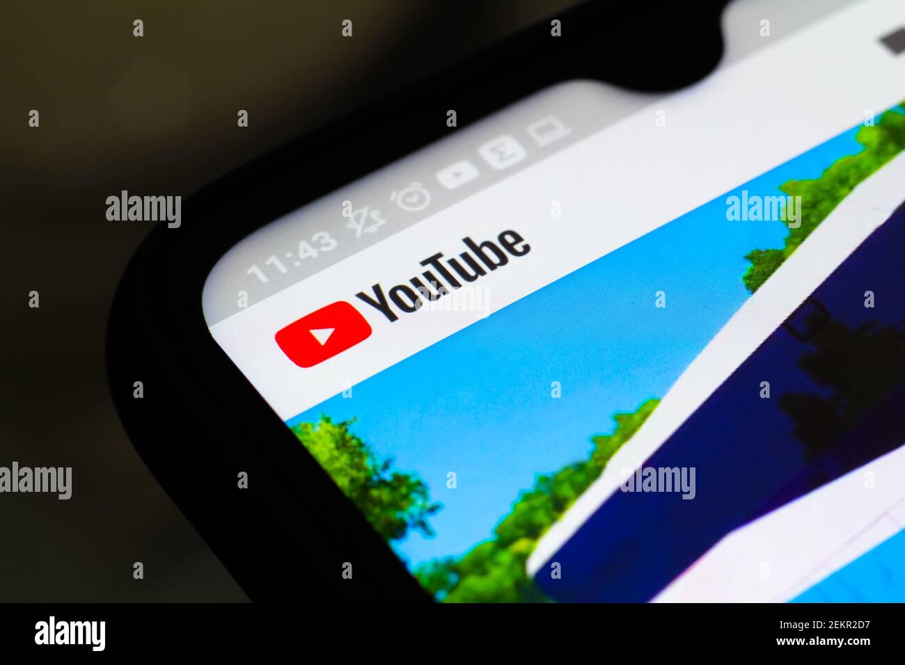 In this photo illustration the YouTube logo seen displayed on a ...