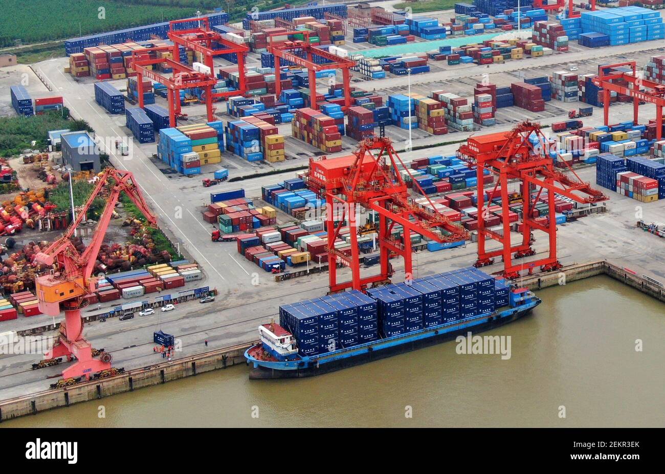 default People busy working at the Rugao Port in Rugao City, east China ...