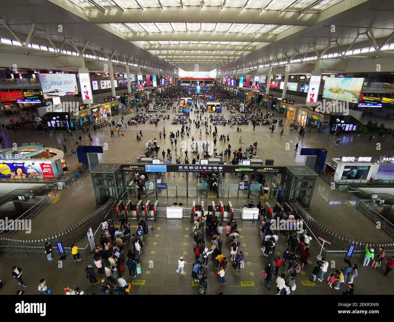 Unlocated photo: Aerial view of people lining up for security check at ...