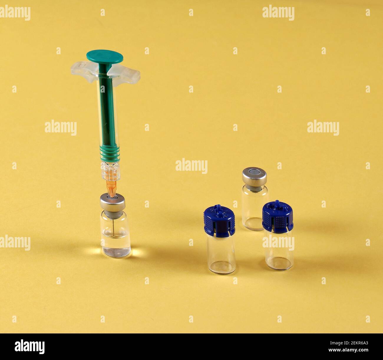 Vaccine glass bottles and vials with syringe inserted in one Stock ...