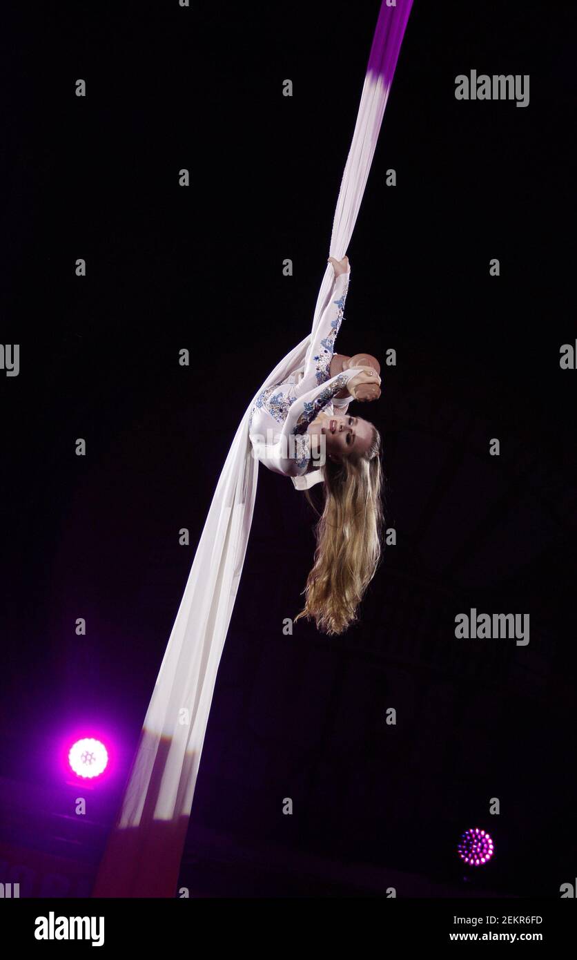 An acrobat performs during a presentation of the new show 'Birthday ...
