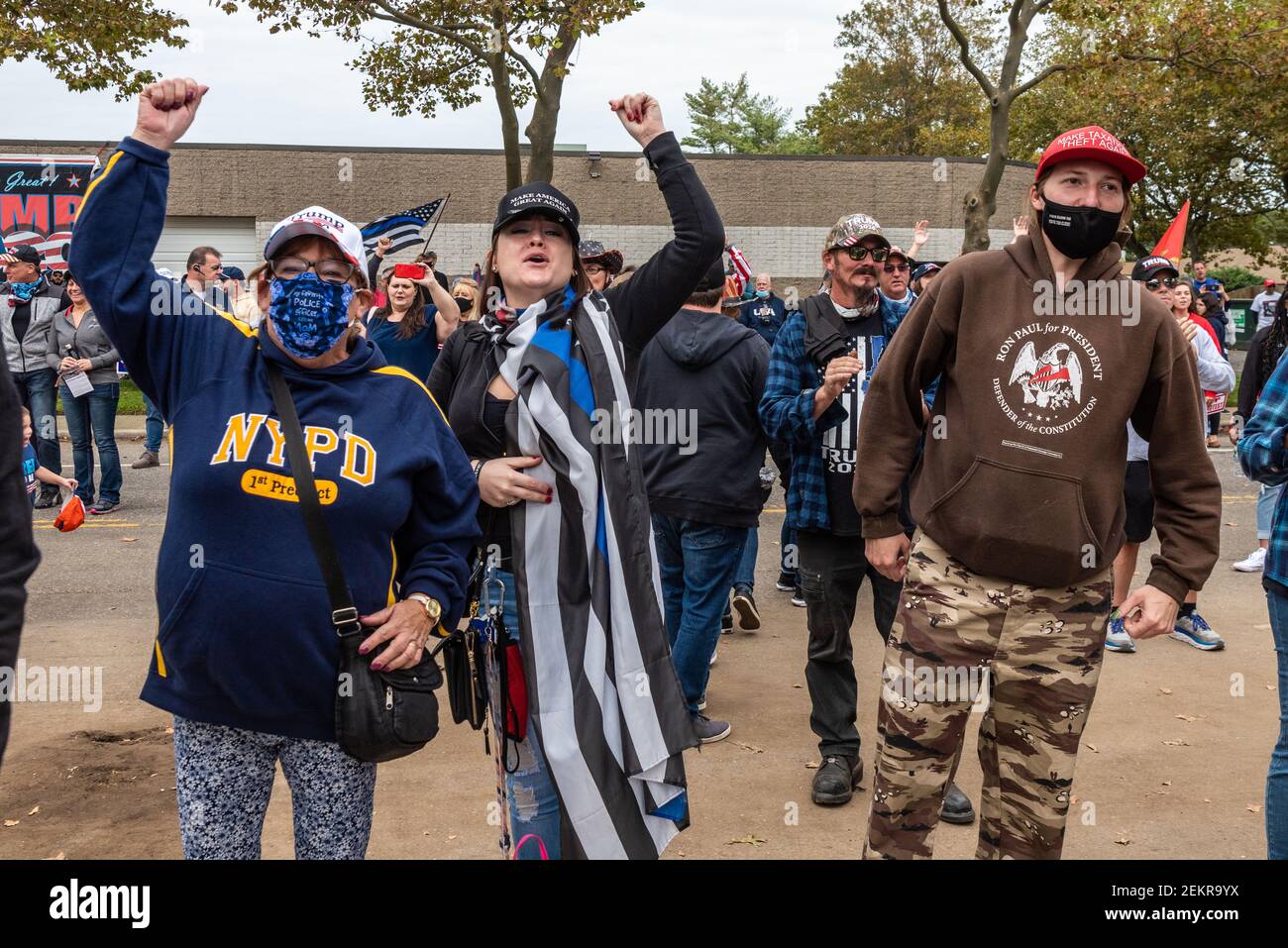 Trump supporters attend an America First rally in Ronkonkoma, New York ...