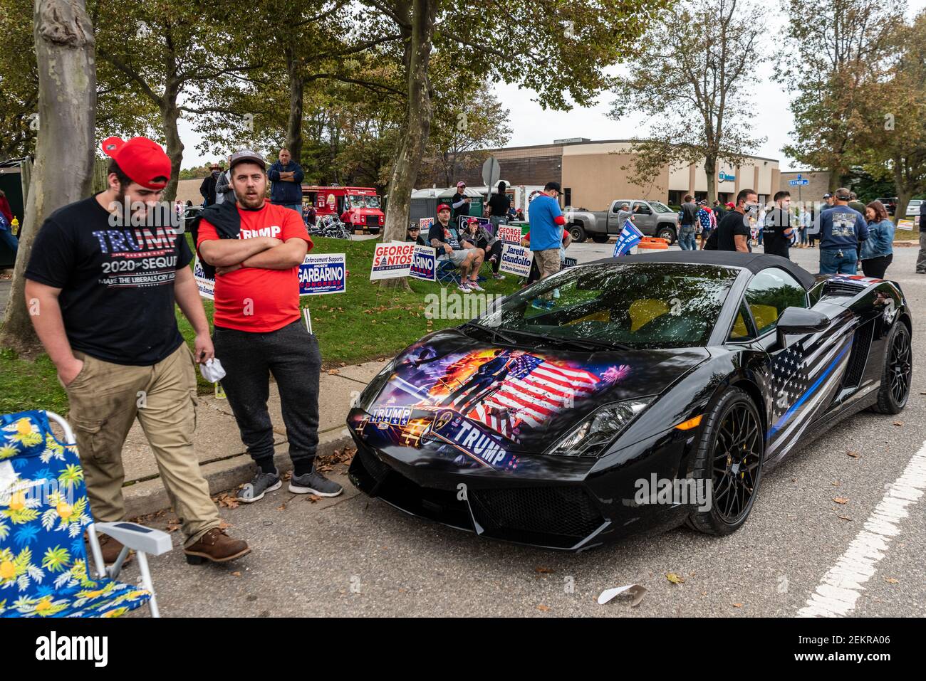 Trump supporters attend an America First rally in Ronkonkoma, New York ...