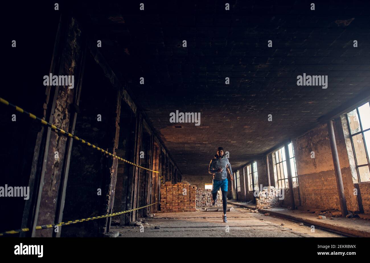 Young attractive handsome afro american active runner in sportswear ...
