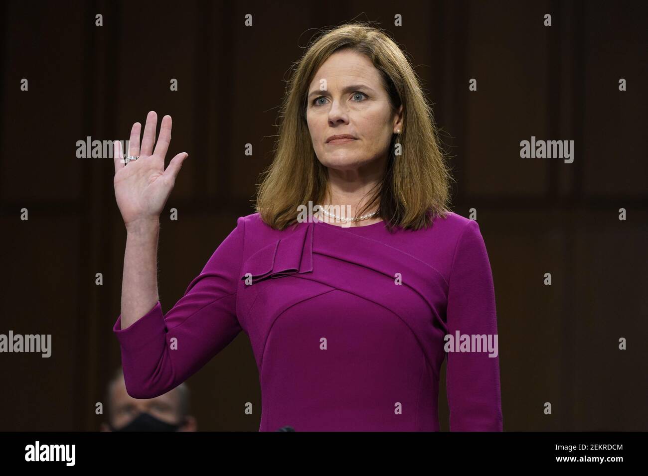 Supreme Court nominee Amy Coney Barrett is sworn in during a ...