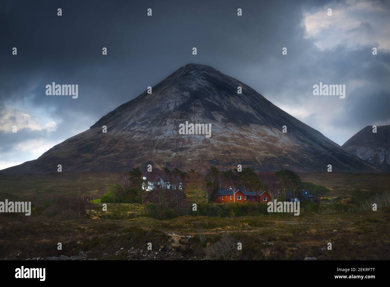 large triangular shaped mountain in Glen Sligachan with typical wooden ...