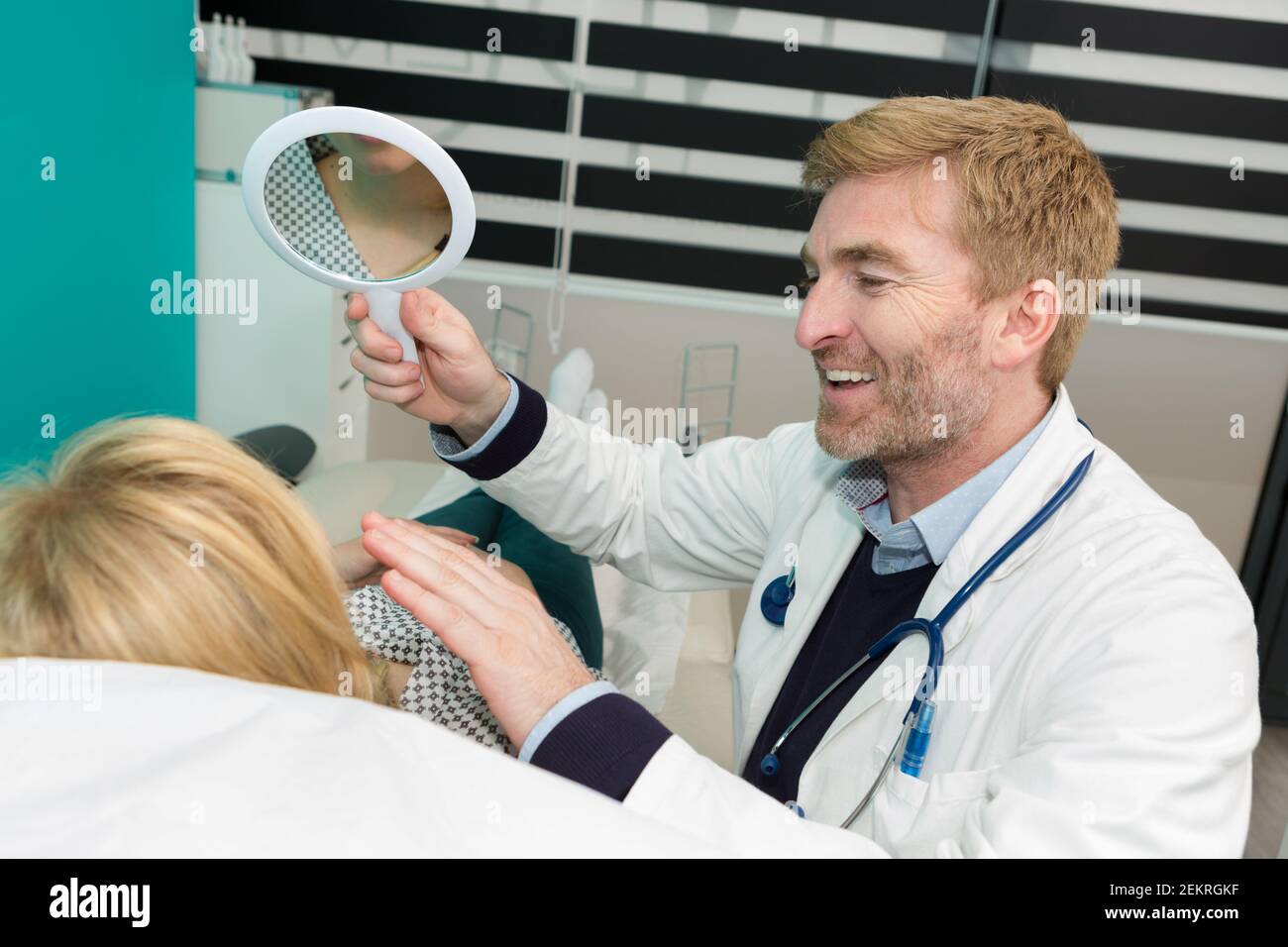 skillful male dental doctor is working with patient Stock Photo - Alamy