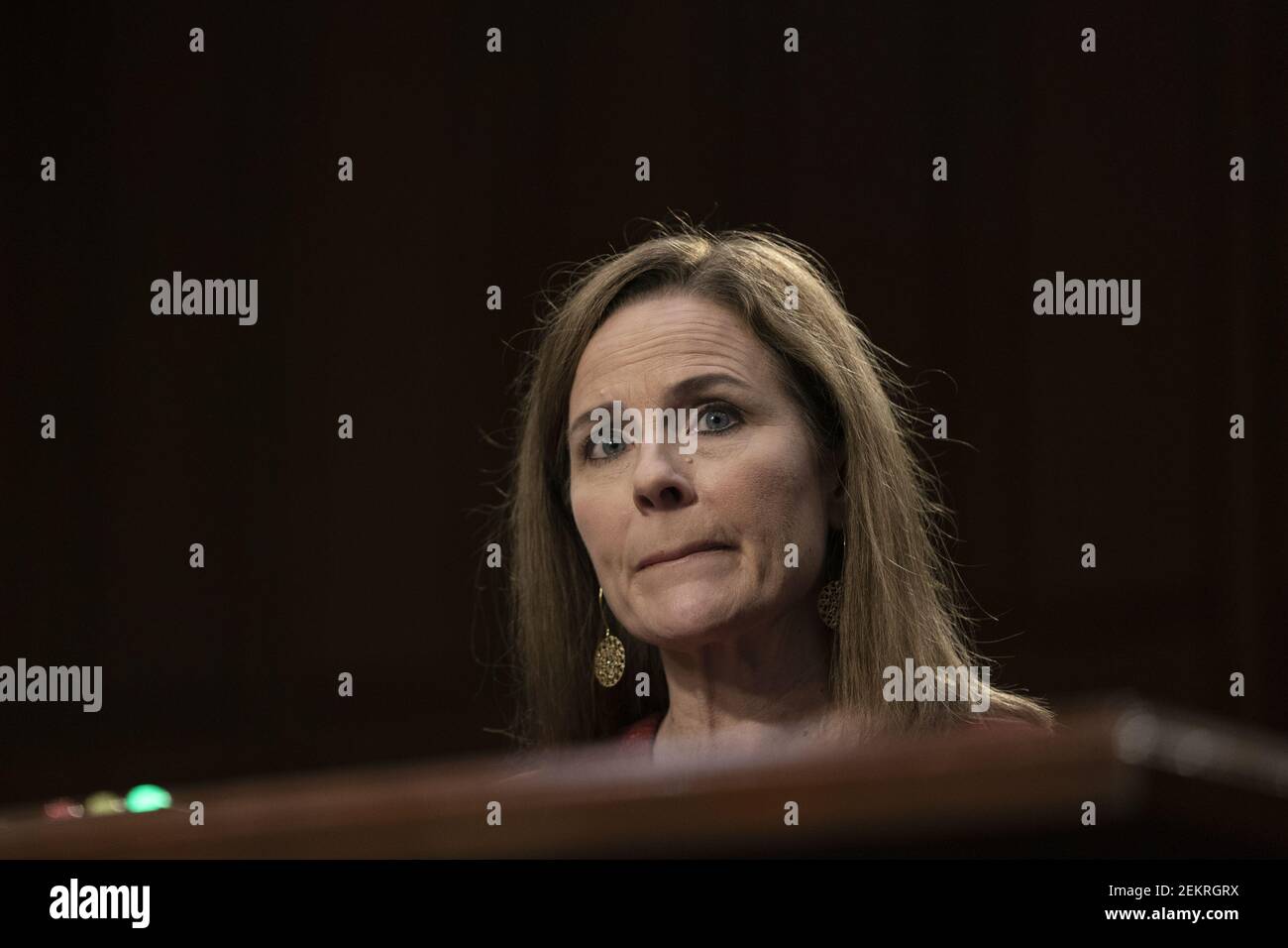 Supreme Court nominee Judge Amy Coney Barrett listens during her ...