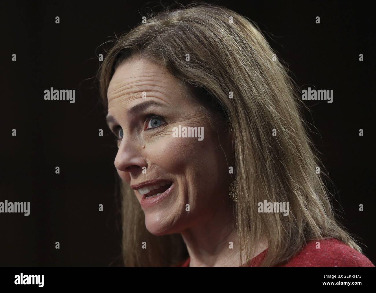 U.S. Supreme Court nominee Judge Amy Coney Barrett reacts as she ...