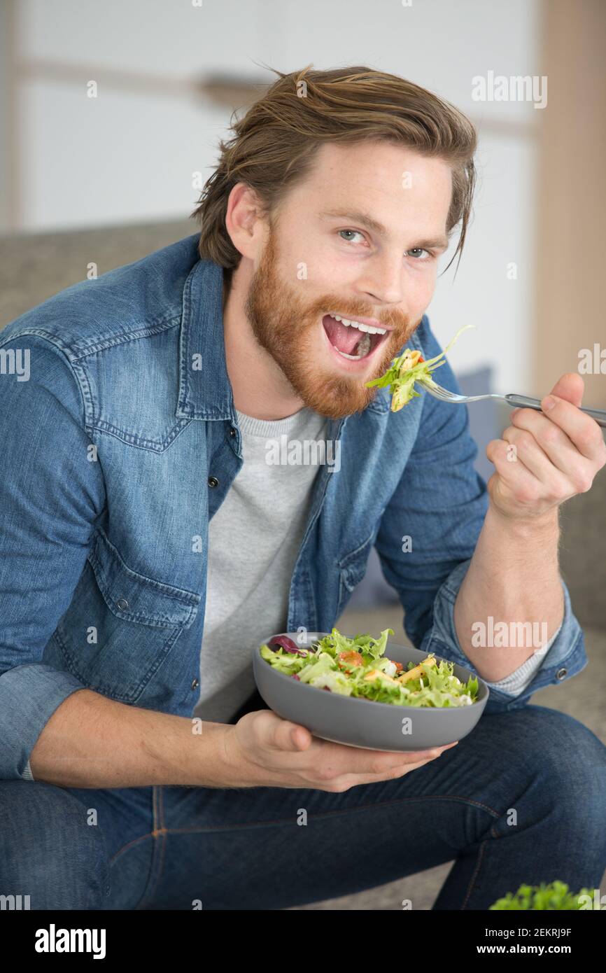 Man laid on sofa hi-res stock photography and images - Alamy