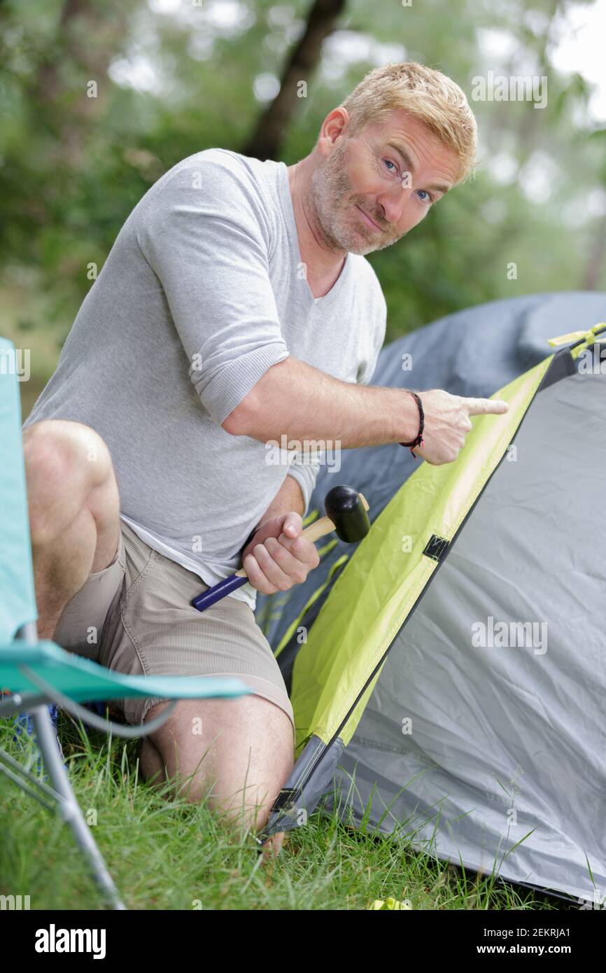 Pitching tent hi-res stock photography and images - Alamy