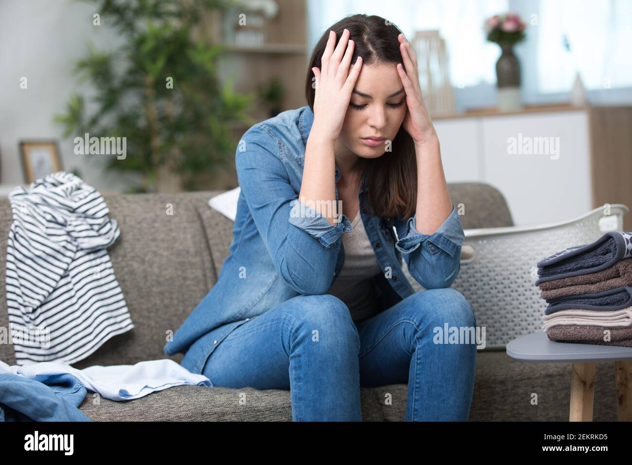young elegant housewife making housekeeping feeling tired a Stock Photo ...