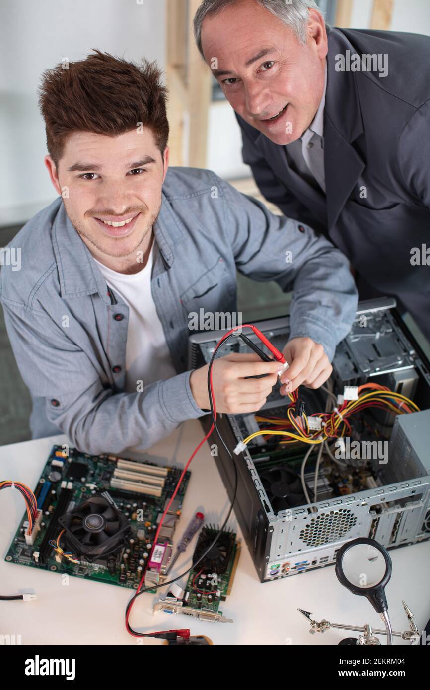 happy and successful young computer engineer Stock Photo - Alamy