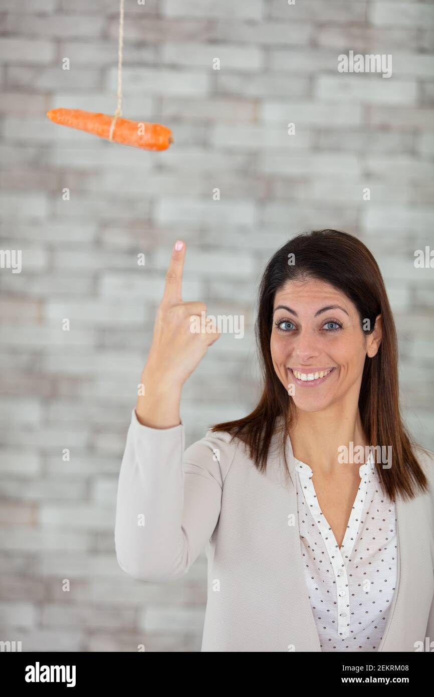 Dangle carrot hi-res stock photography and images - Alamy