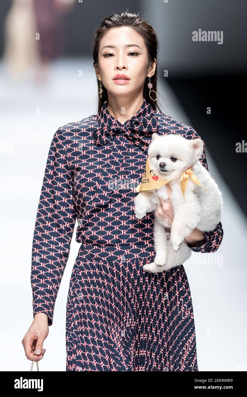 Taiwanese-American singer, songwriter, actress, composer and producer Cindy Yen on the catwalk ...
