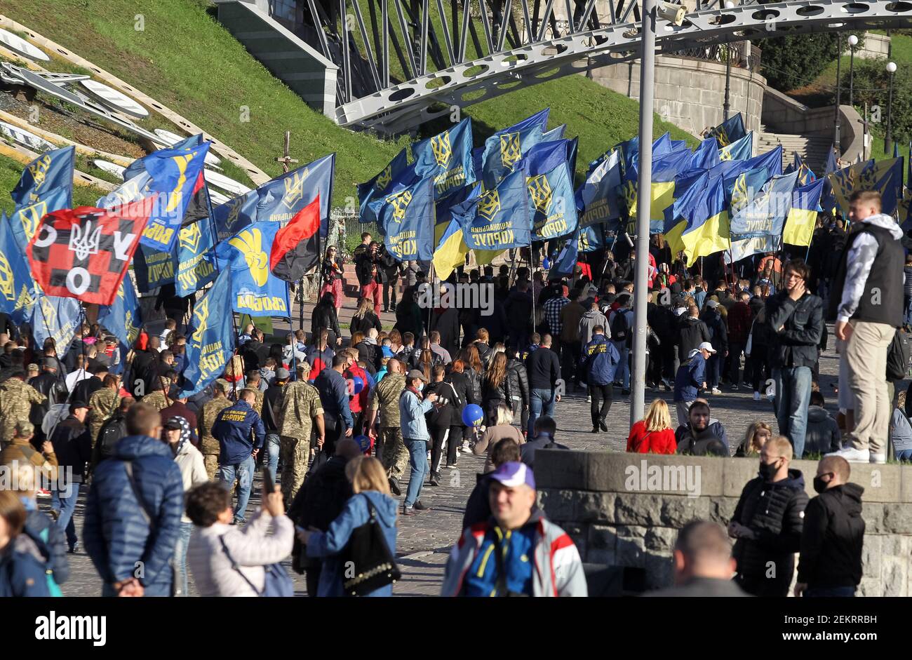 Ukrainian far-right activists holding flags attend the march ...