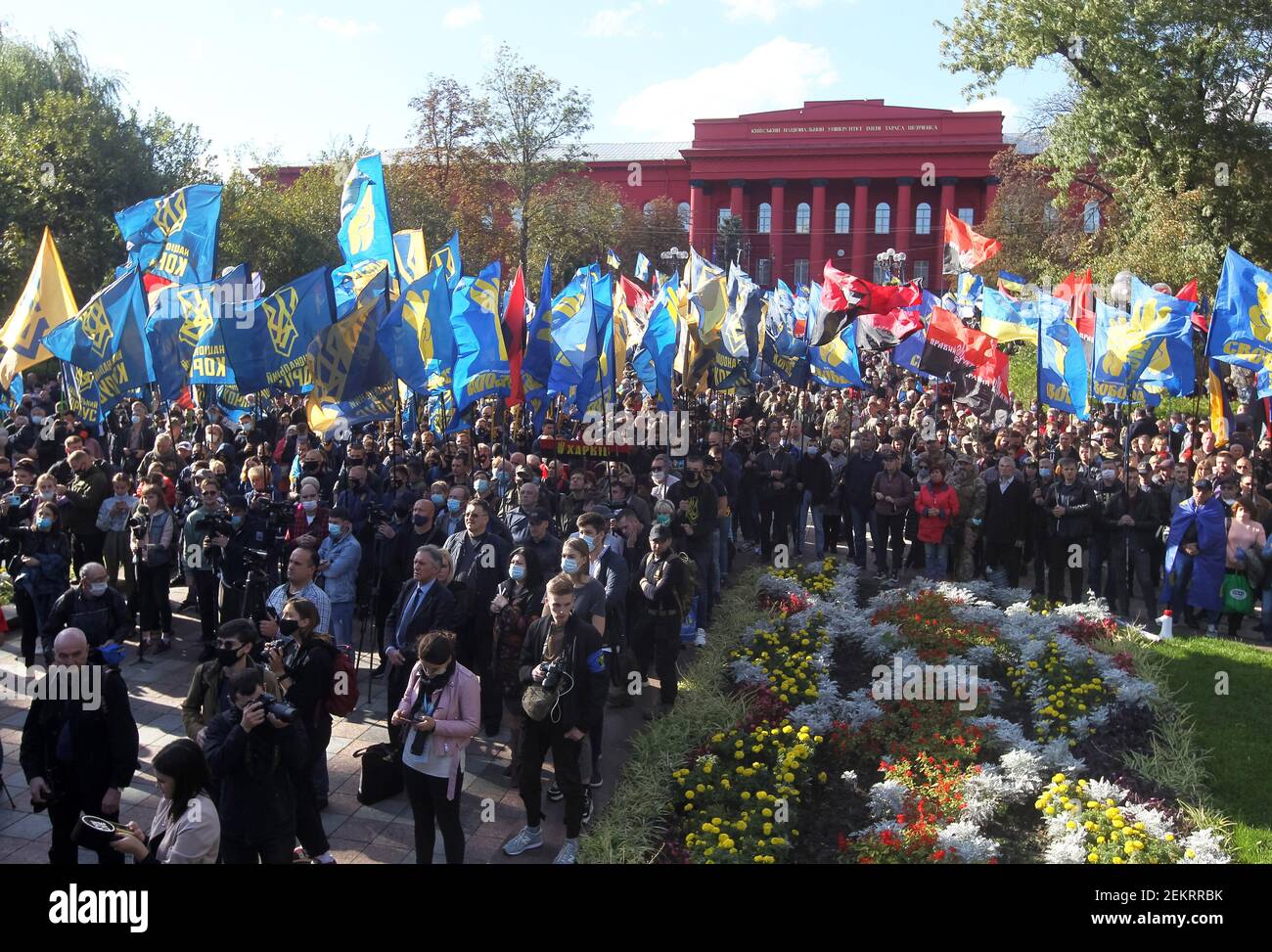 Ukrainian far-right activists holding flags attend the march ...