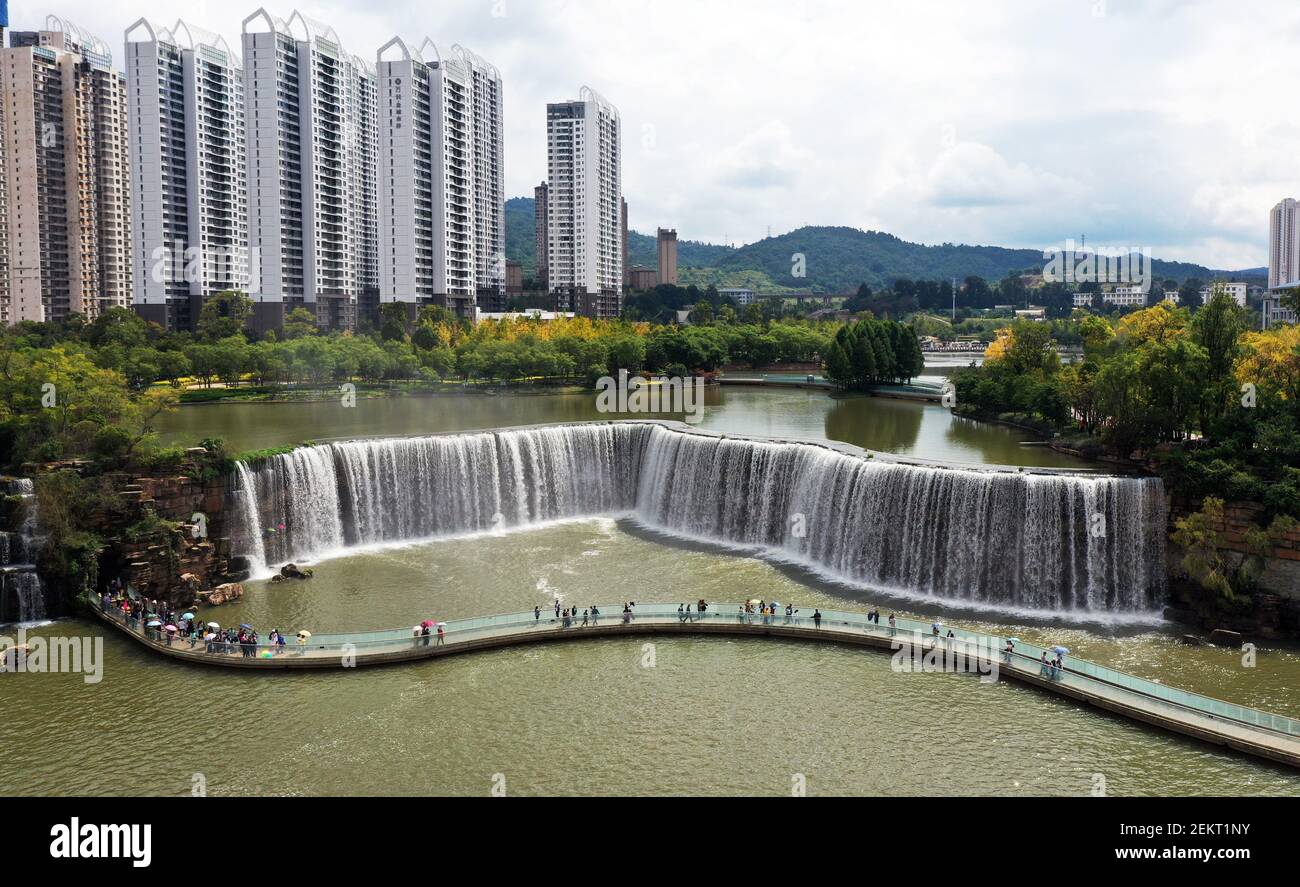 Aerial view of the Kunming Waterfall Park in Kunming city, an enormous ...