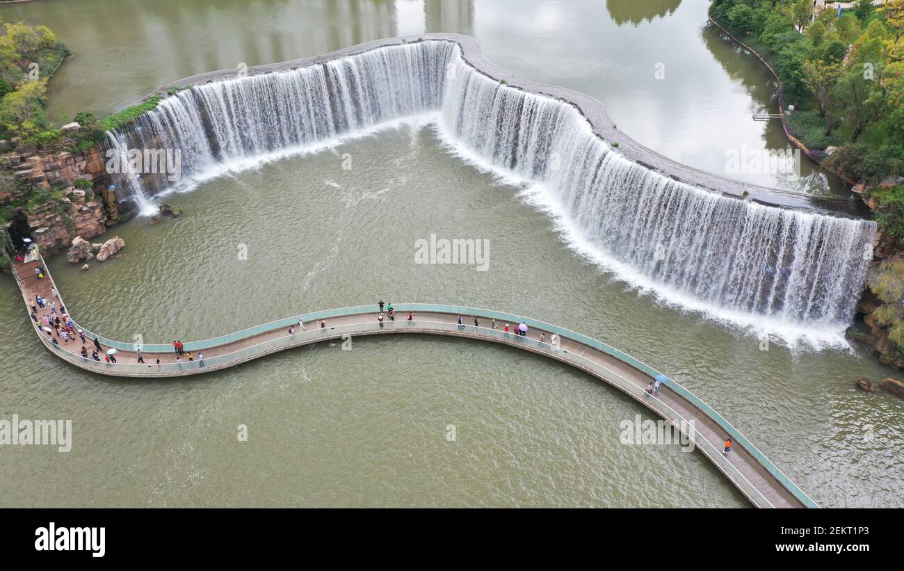Aerial view of the Kunming Waterfall Park in Kunming city, an enormous ...