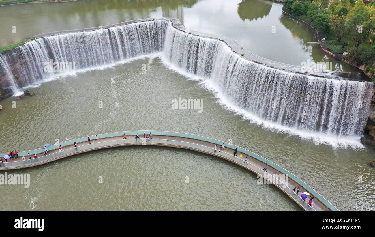 Aerial view of the Kunming Waterfall Park in Kunming city, an enormous ...