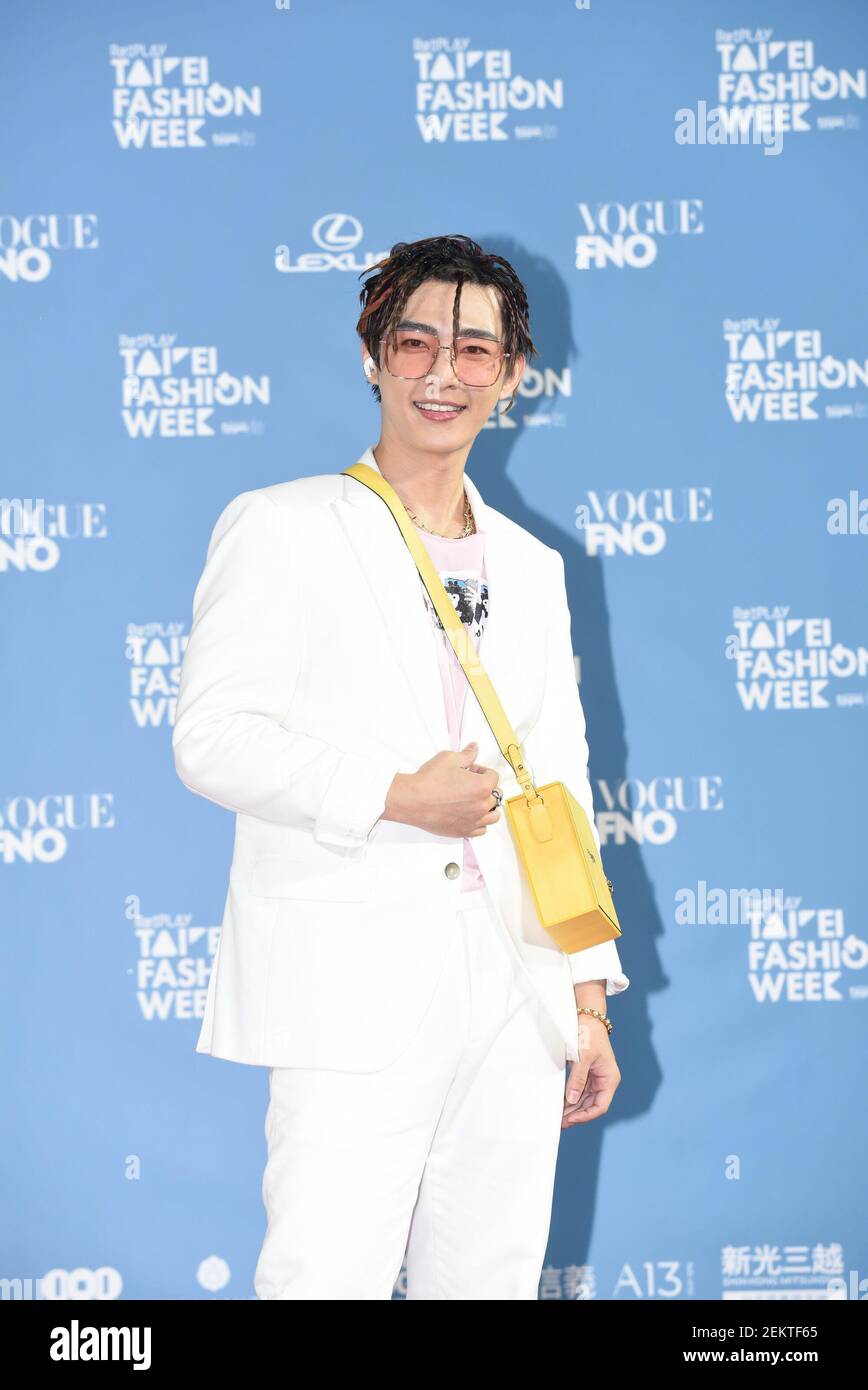 Taiwanese actor and singer Aaron Yan, white, attends 2020 Taipei ...
