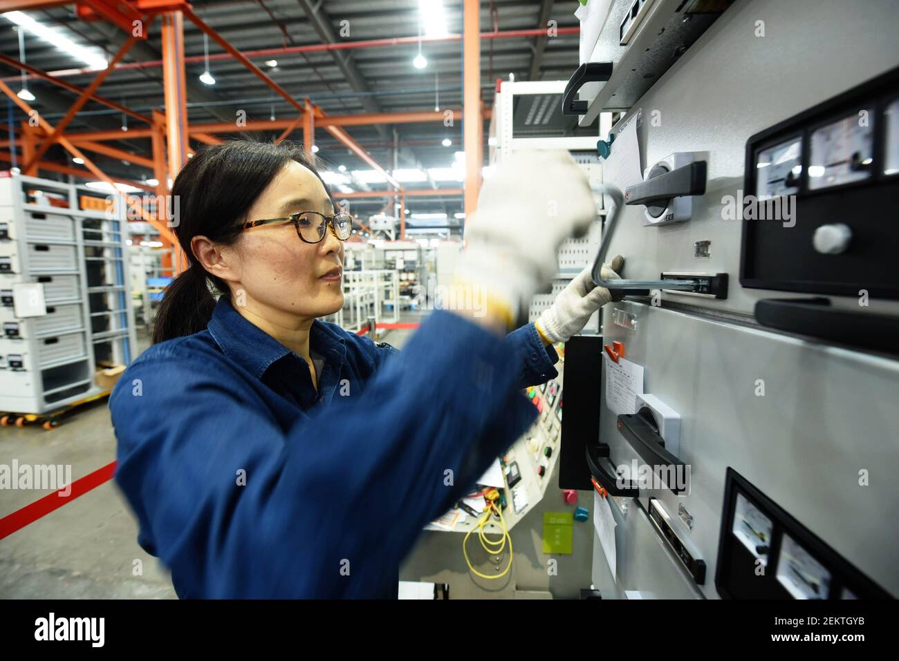 HANGZHOU, CHINA - OCTOBER 19, 2020 - An employee of an electrical ...