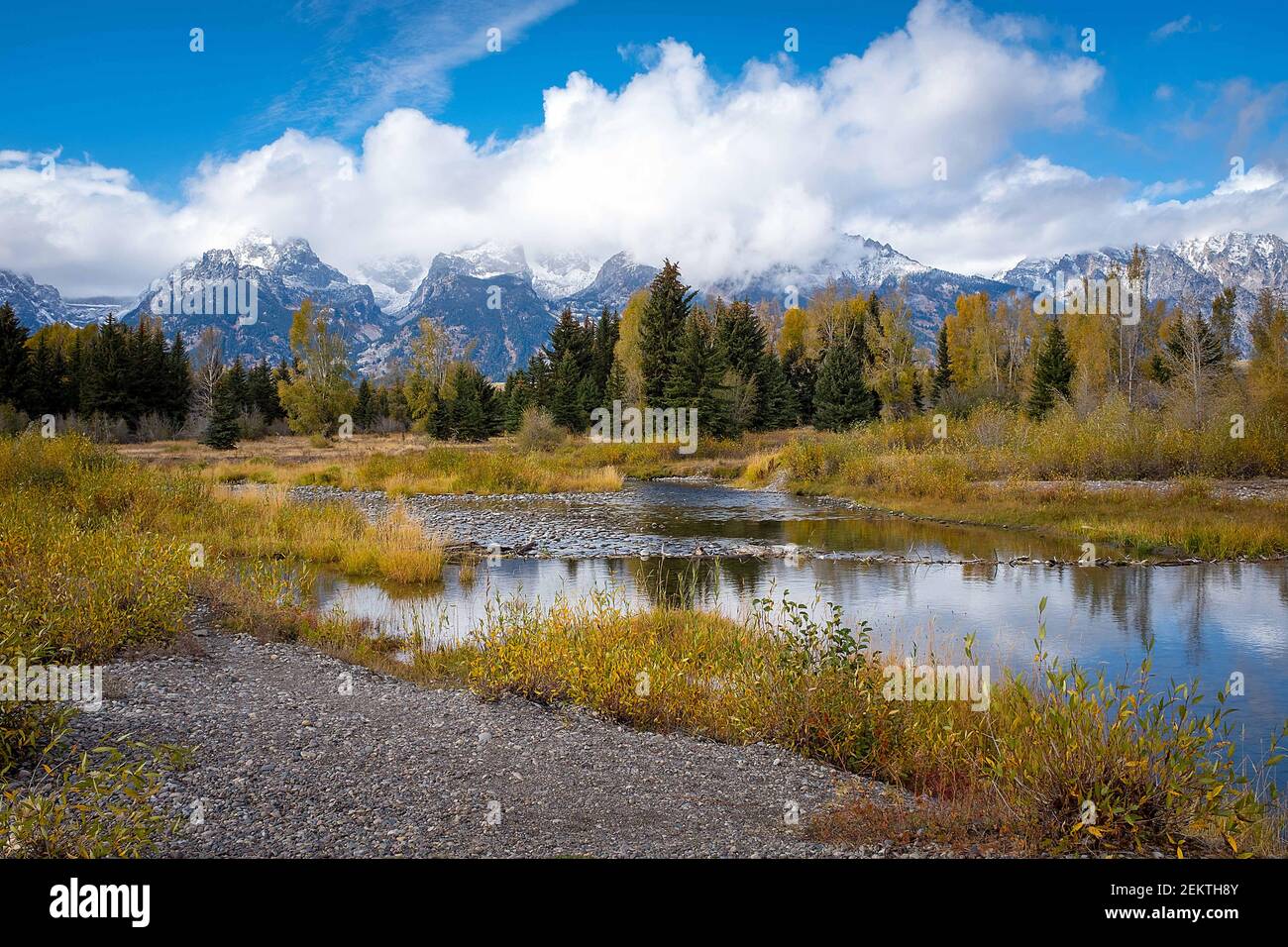 September 26, 2020: Autumn colors along the Snake River's Schwabacher's Landing below a stormy ...
