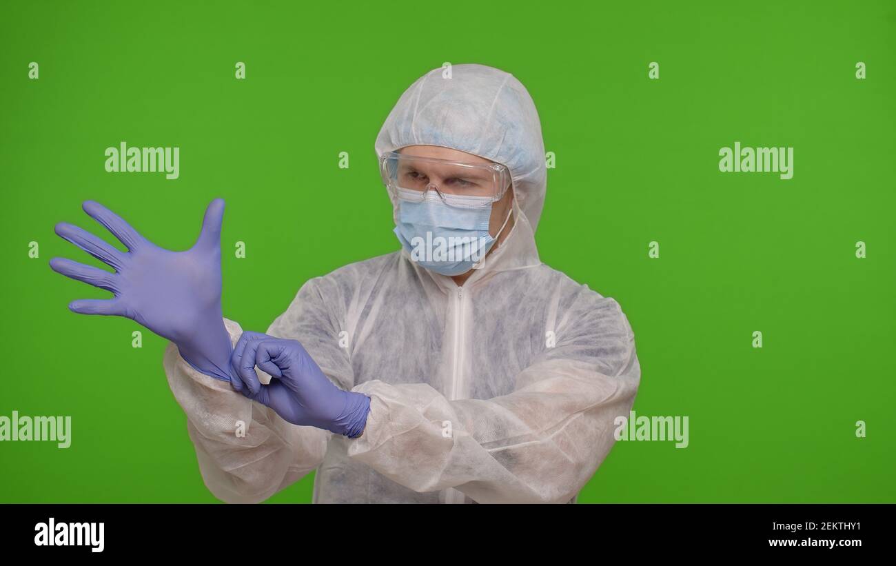 Doctor puts protective screen hi-res stock photography and images - Alamy